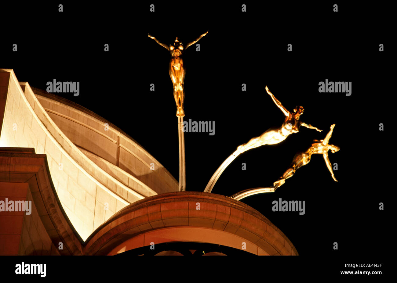 Statues of diving women in gold above Picadilly Circus London W1 ...