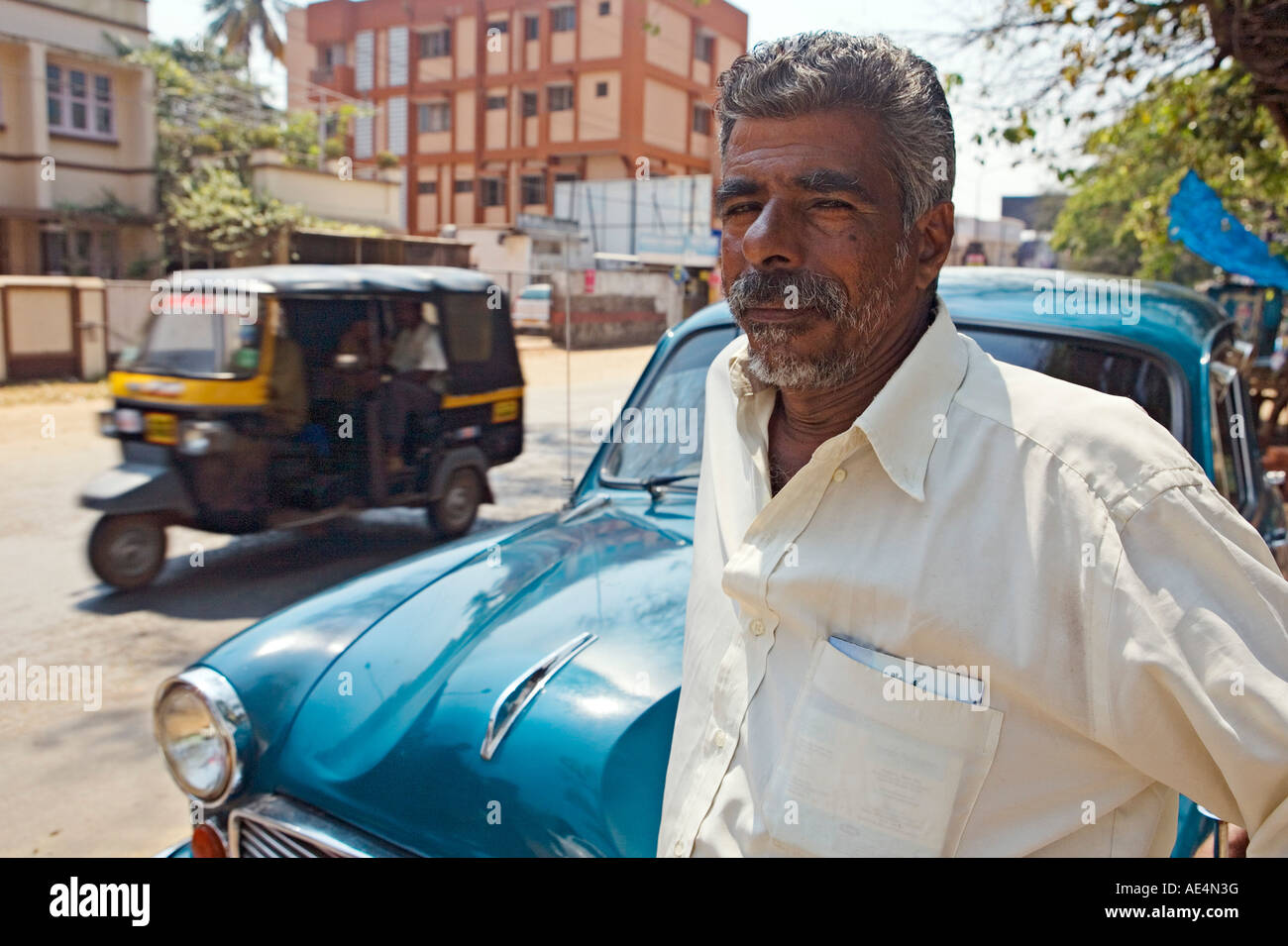 INDIA KERALA ALAPPUZHA TAXI DRIVER WITH BLUE AMBASSADOR TAXI Stock ...