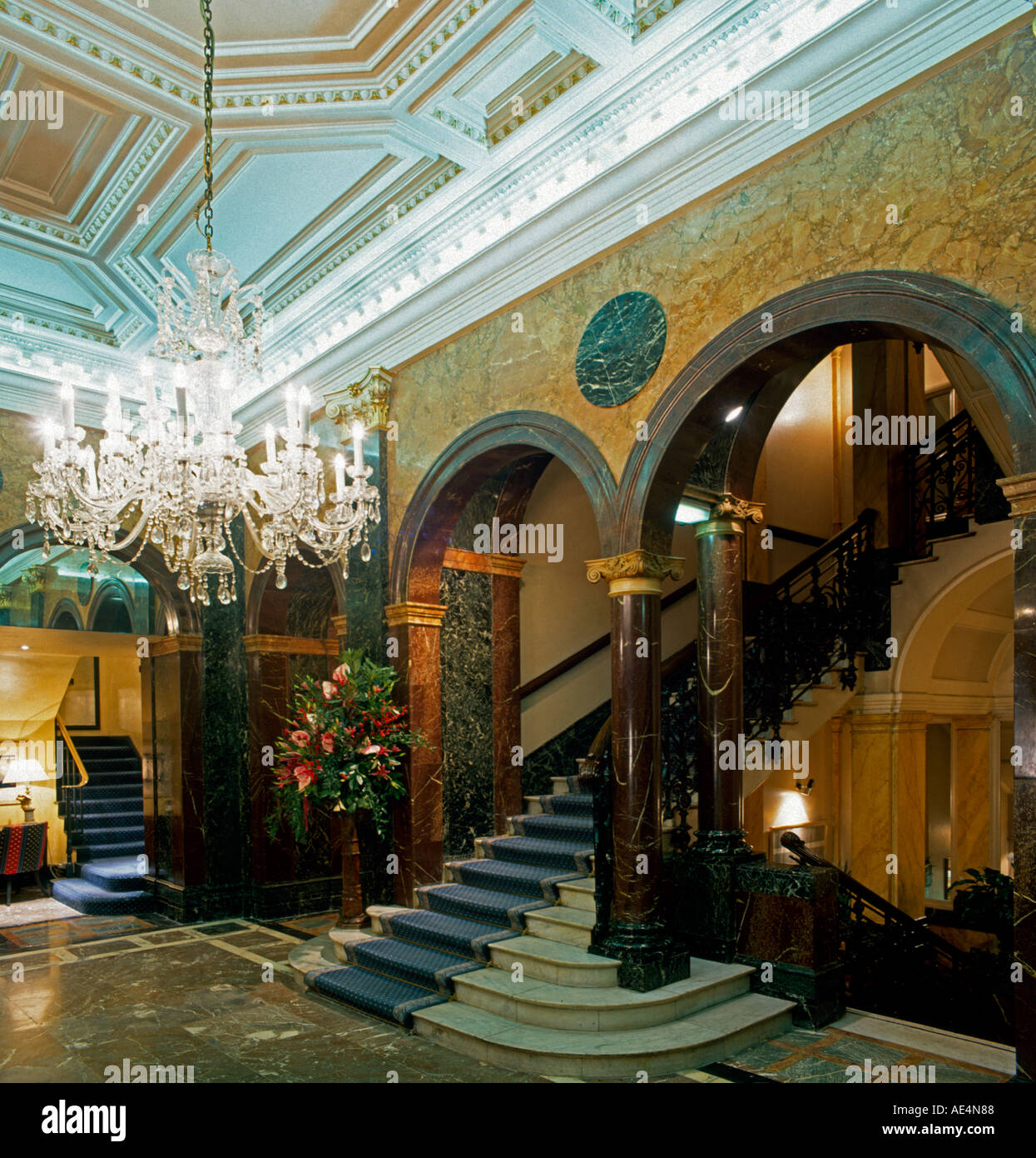 Grand Entrance stairway with chandelier and marble in Hyde Park Hotel ...