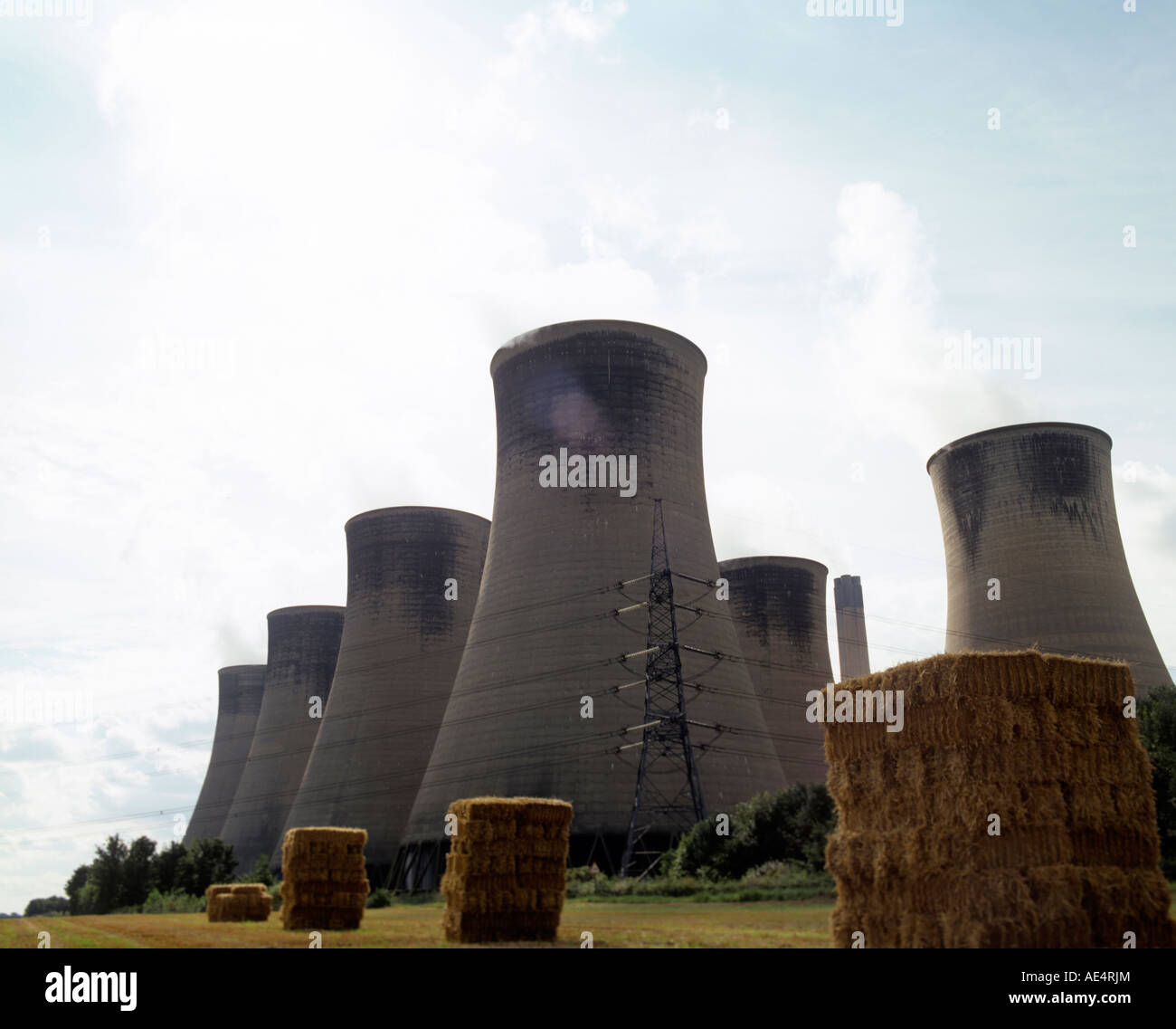 POWER STATION COOLING STATION AND HAY BALES IN ADJACENT FIELD Stock ...