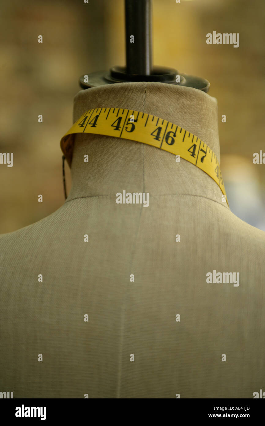 Tailors dummy with a tape measure Stock Photo - Alamy
