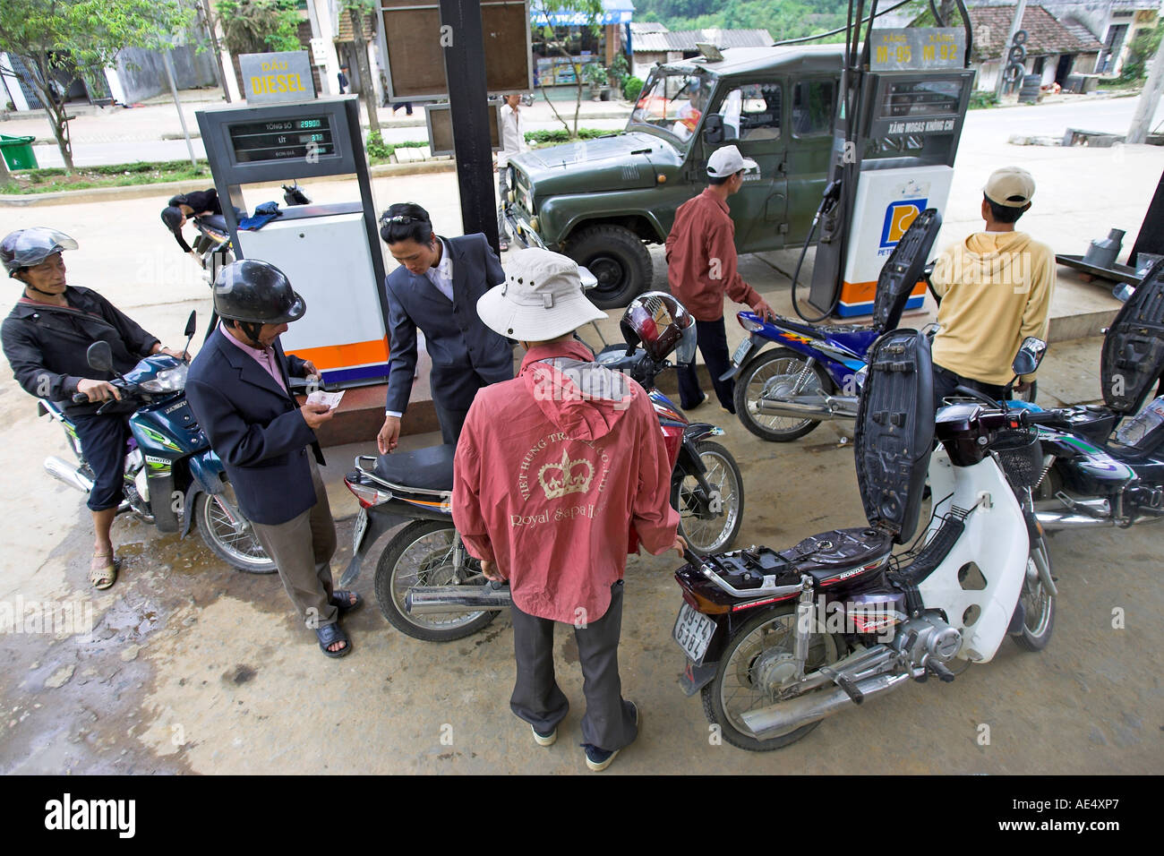 Filling motorcycle tank gas station hi-res stock photography and images ...