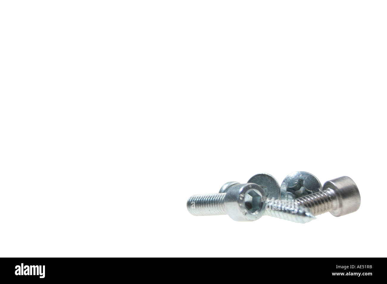 Nuts screws on white Cut Out Stock Images & Pictures - Alamy