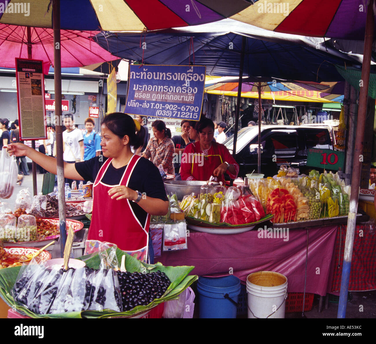 Merchant at Chatuchak Weekend Market , Bangkok , Thailand Stock Photo ...