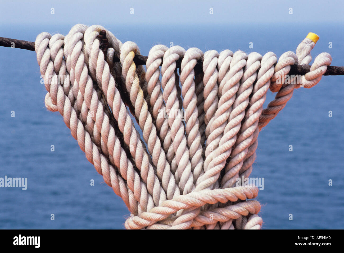 coiled natural fibre cordage hemp/manilla/sisal on guardrails of ship ...
