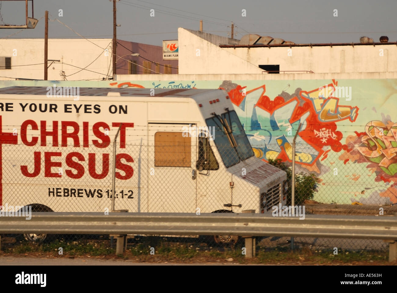 A van parked by the roadside in Miami with Jesus Christ written on the ...