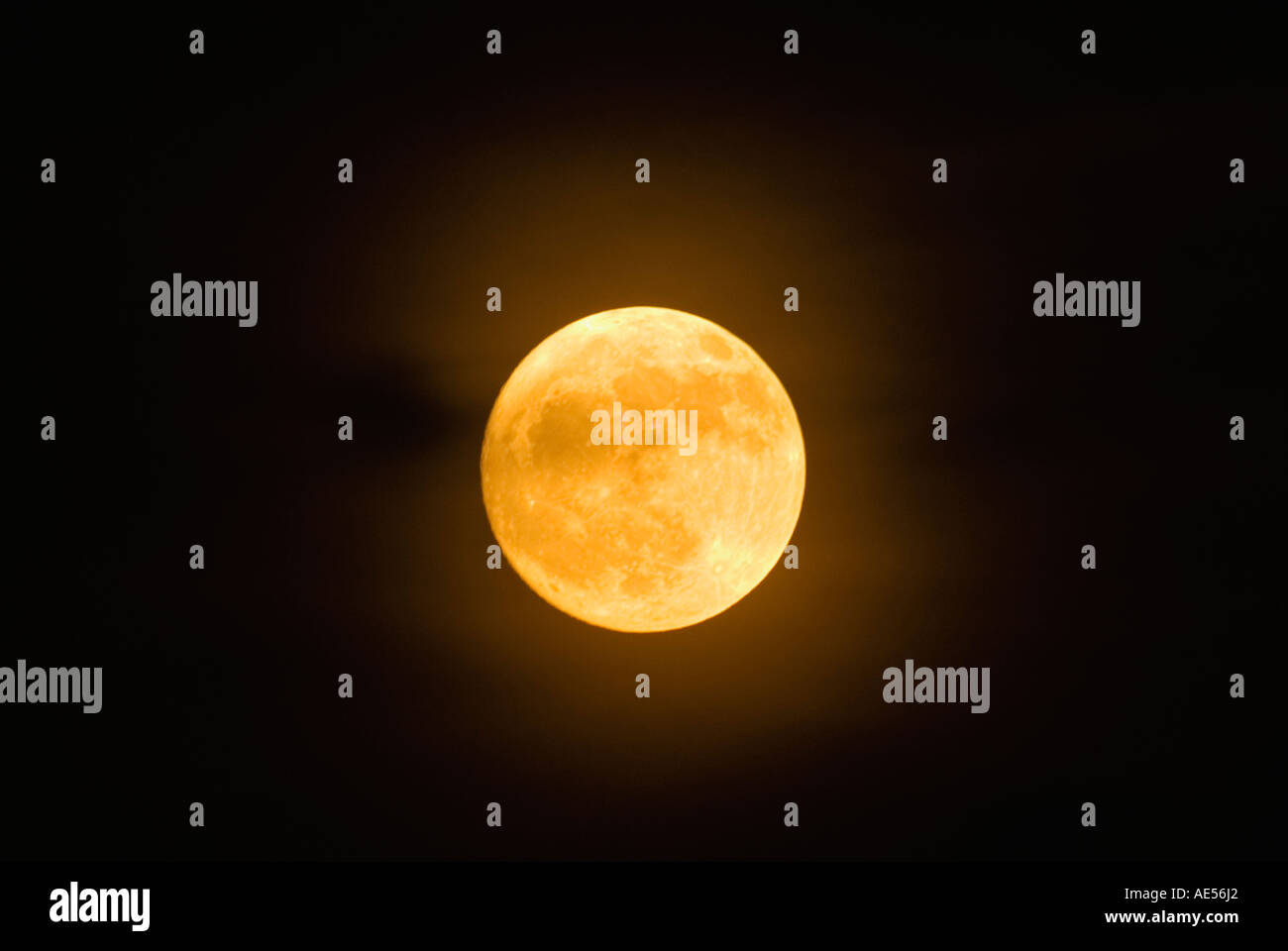 Hazy Full Yellow Moon Stock Photo - Alamy