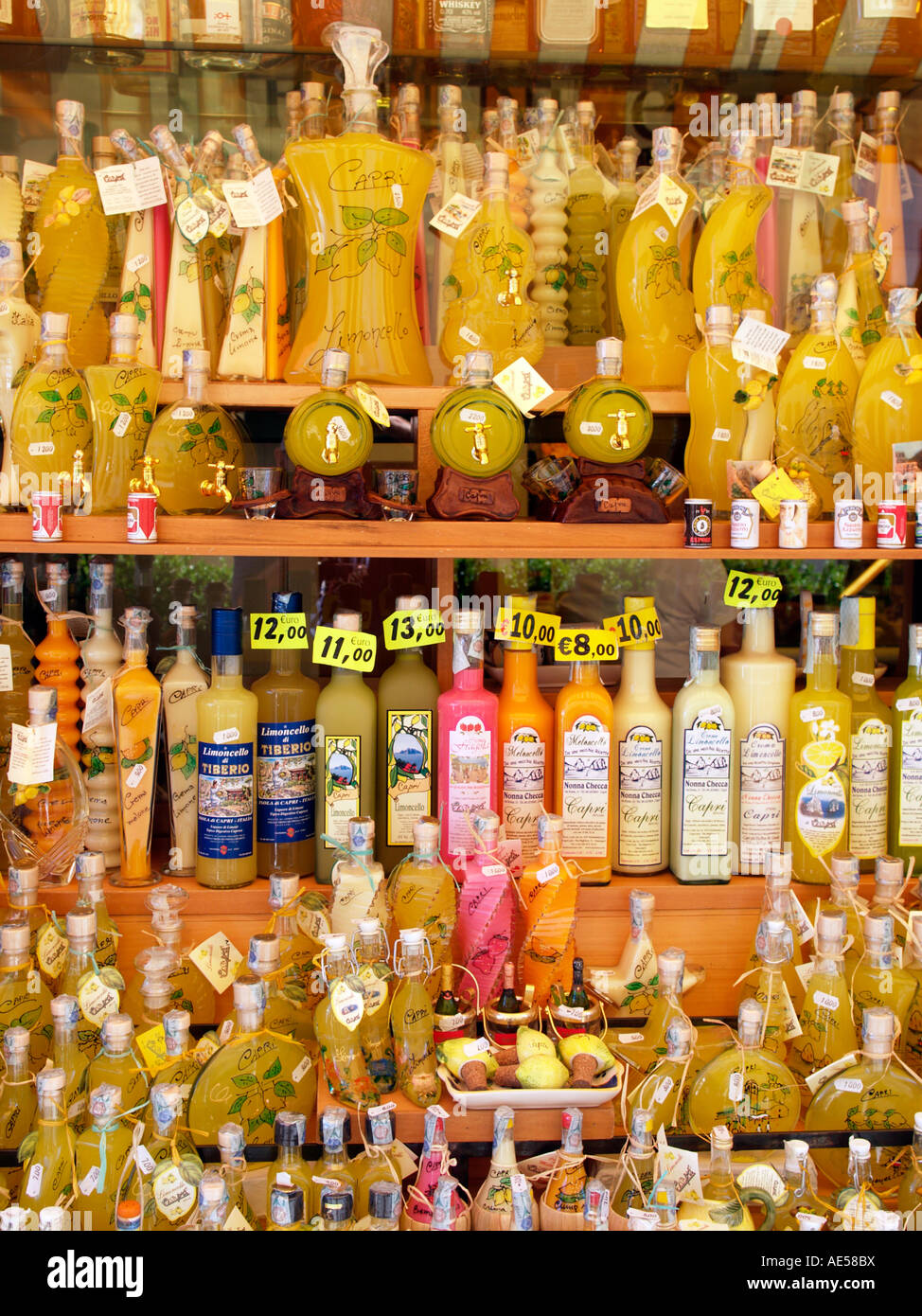 bottles of limoncello liquor on display in shop window Capri Italy ...