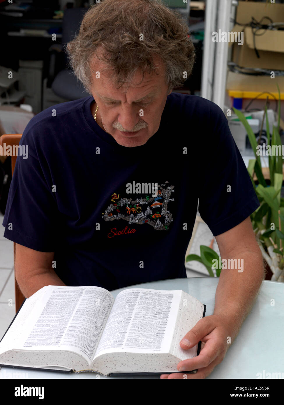 Looking for Word in Dictionary Stock Photo - Alamy