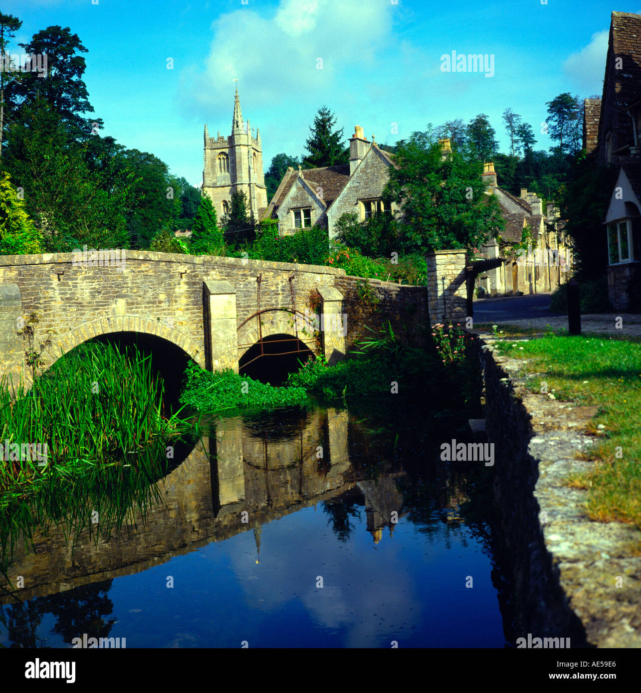River and pack horse bridge Castle Combe Cotswolds village Wiltshire ...