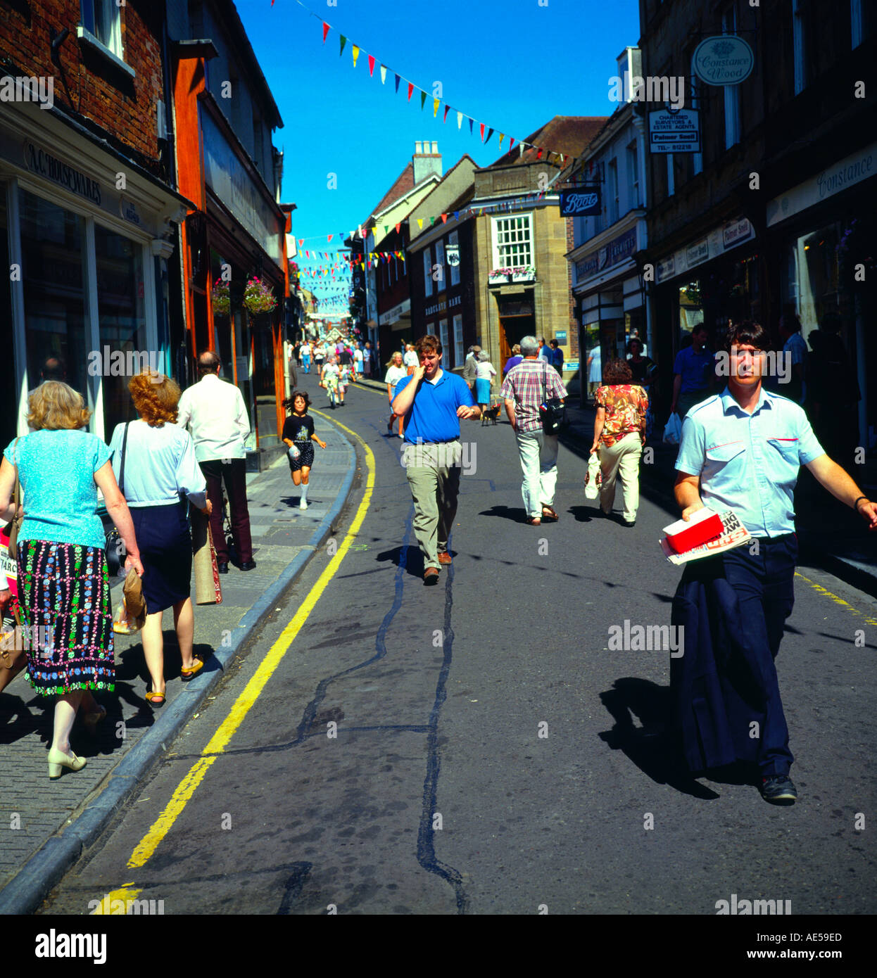 Sherborne high street with shops and shoppers Dorset England Stock ...