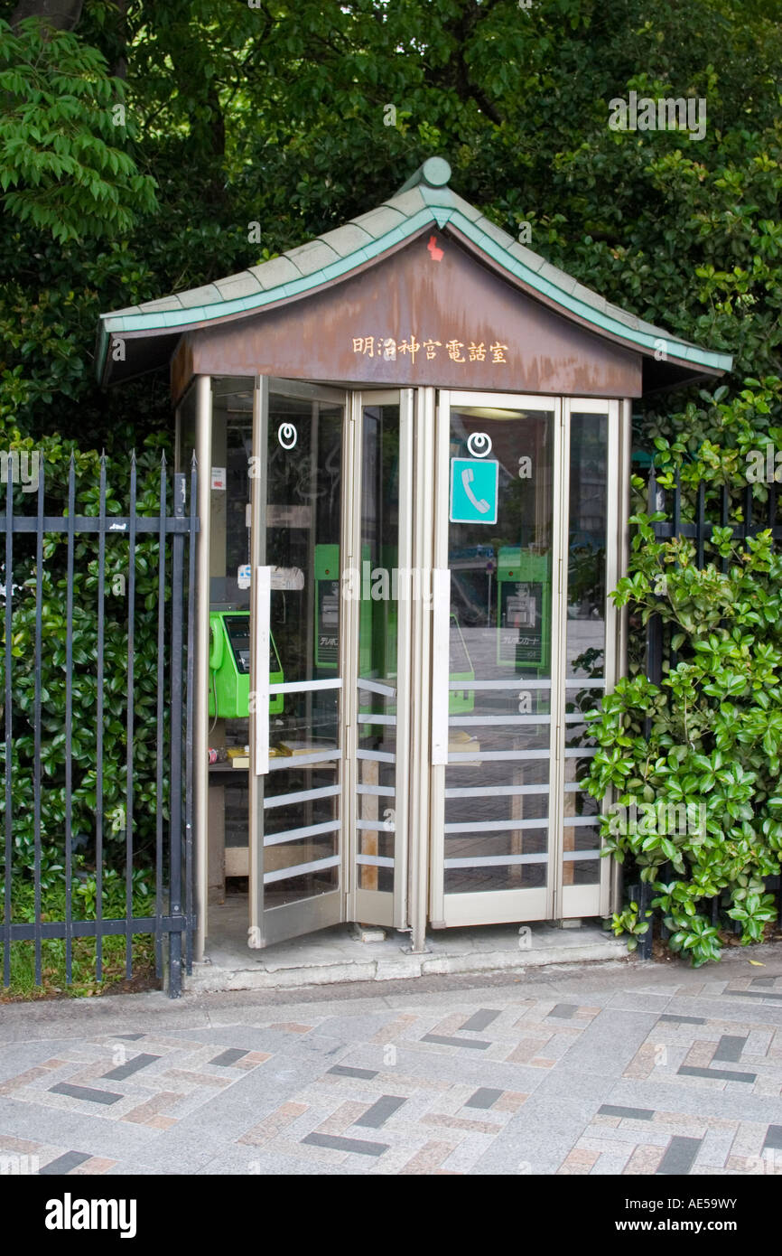 Japanese phone booth with traditional Japanese tiled roof, outside the ...