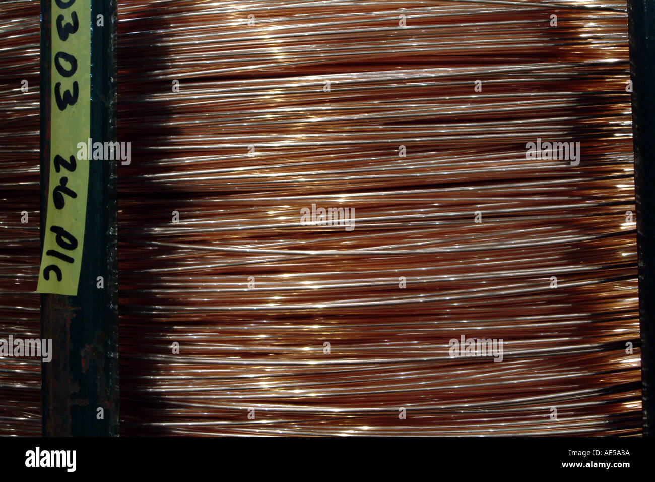 Copper Wire on Reel coil metal Stock Photo - Alamy