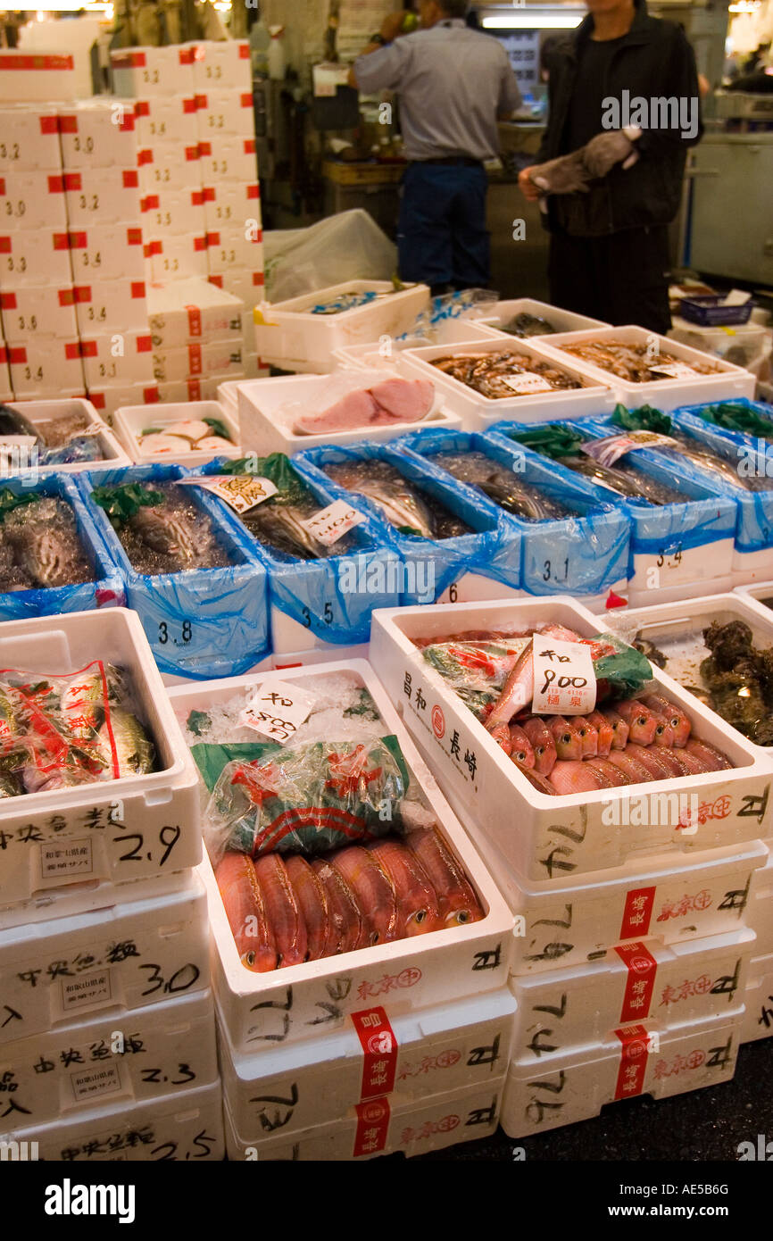 Fish displayed in styrofoam containers in stall at Tsukiji Fish Market ...