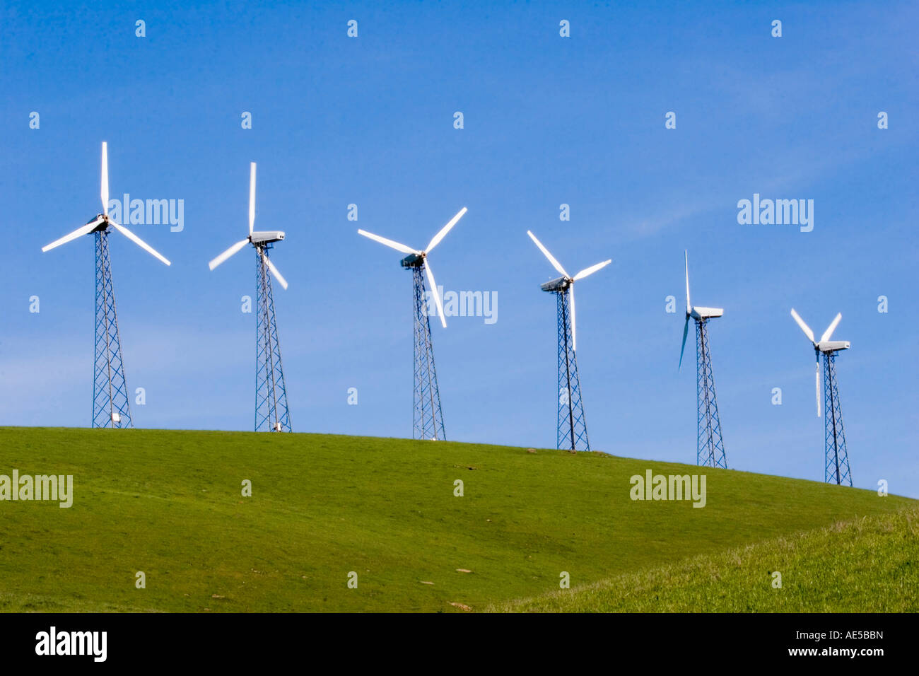Row of wind turbines on a hill hi-res stock photography and images - Alamy