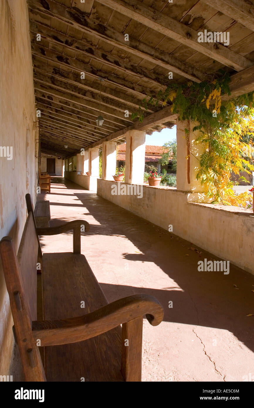 Benches lining portico by courtyard at Carmel Mission - typical of ...