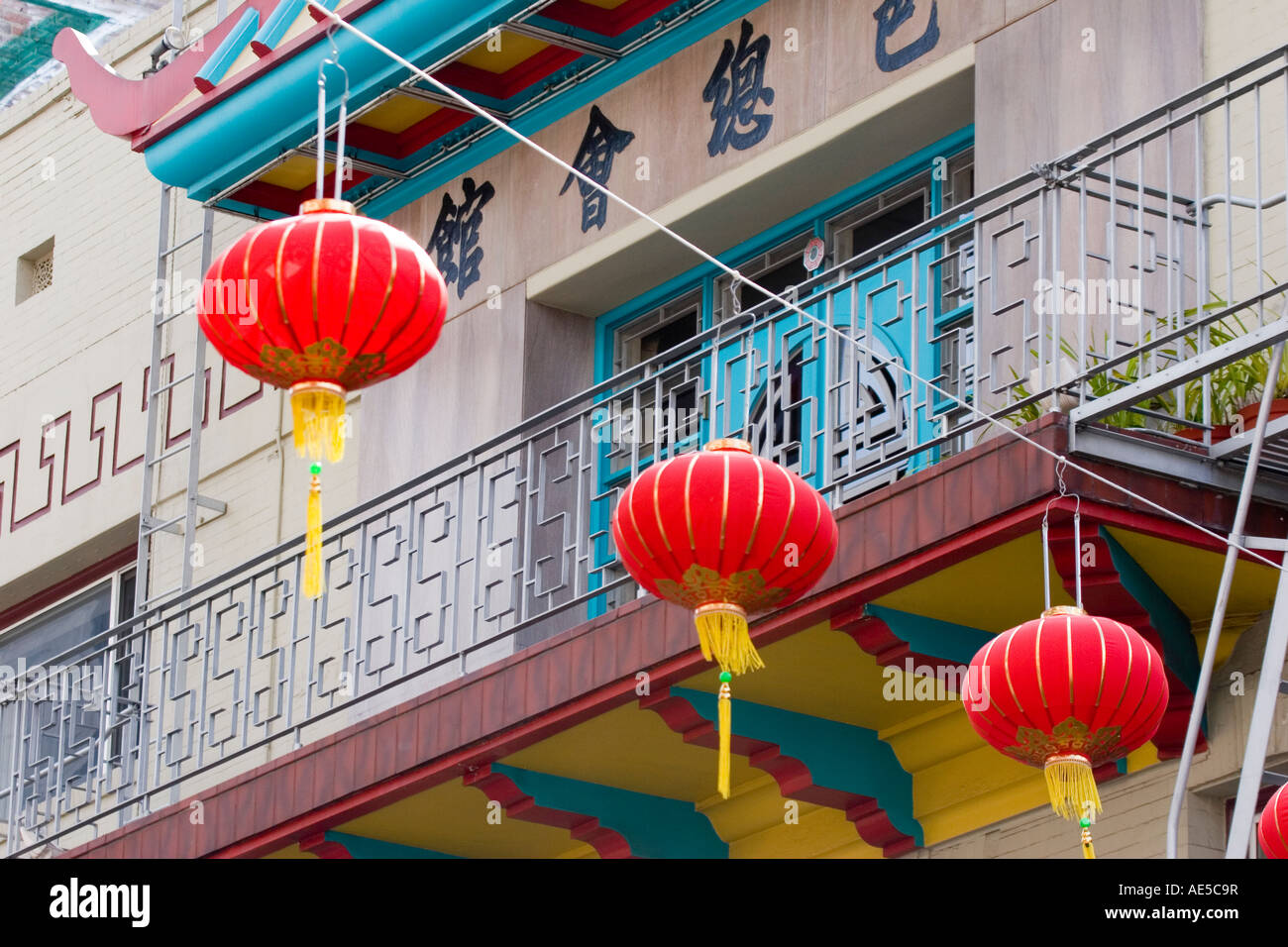 Bright red lanterns strung across San Francisco Chinatown street in ...