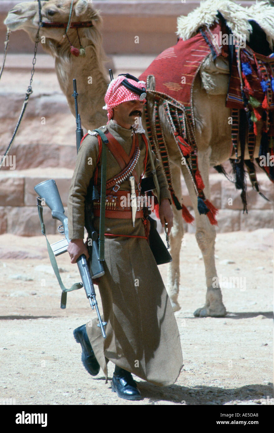 Camel Corps soldier carrying rifle in Petra Jordan Stock Photo - Alamy