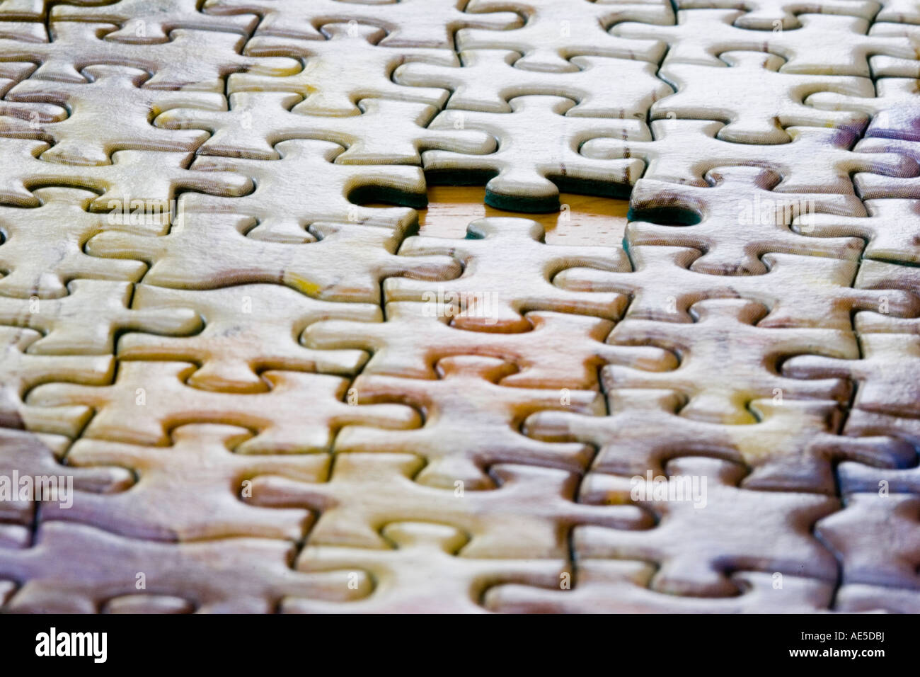 Jigsaw puzzle pieces connected together with one missing piece Stock ...