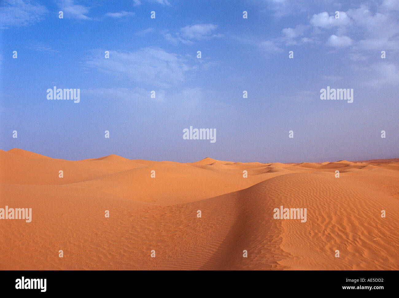 Blue skies and sand dunes in the Sahara Desert Morocco Stock Photo - Alamy