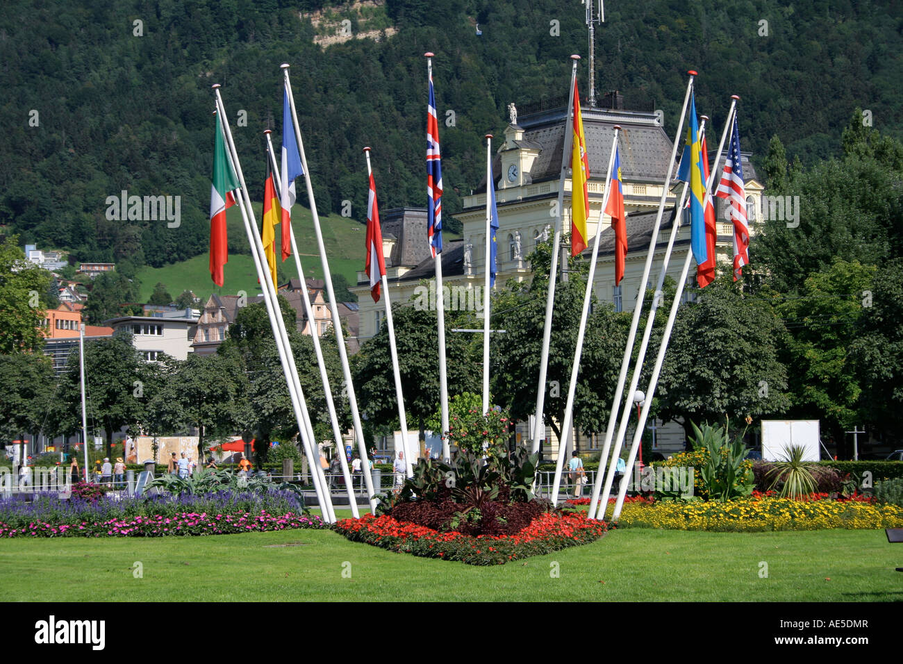 Park with flags in the sea promenade Bregenz in Lake of Constance ...
