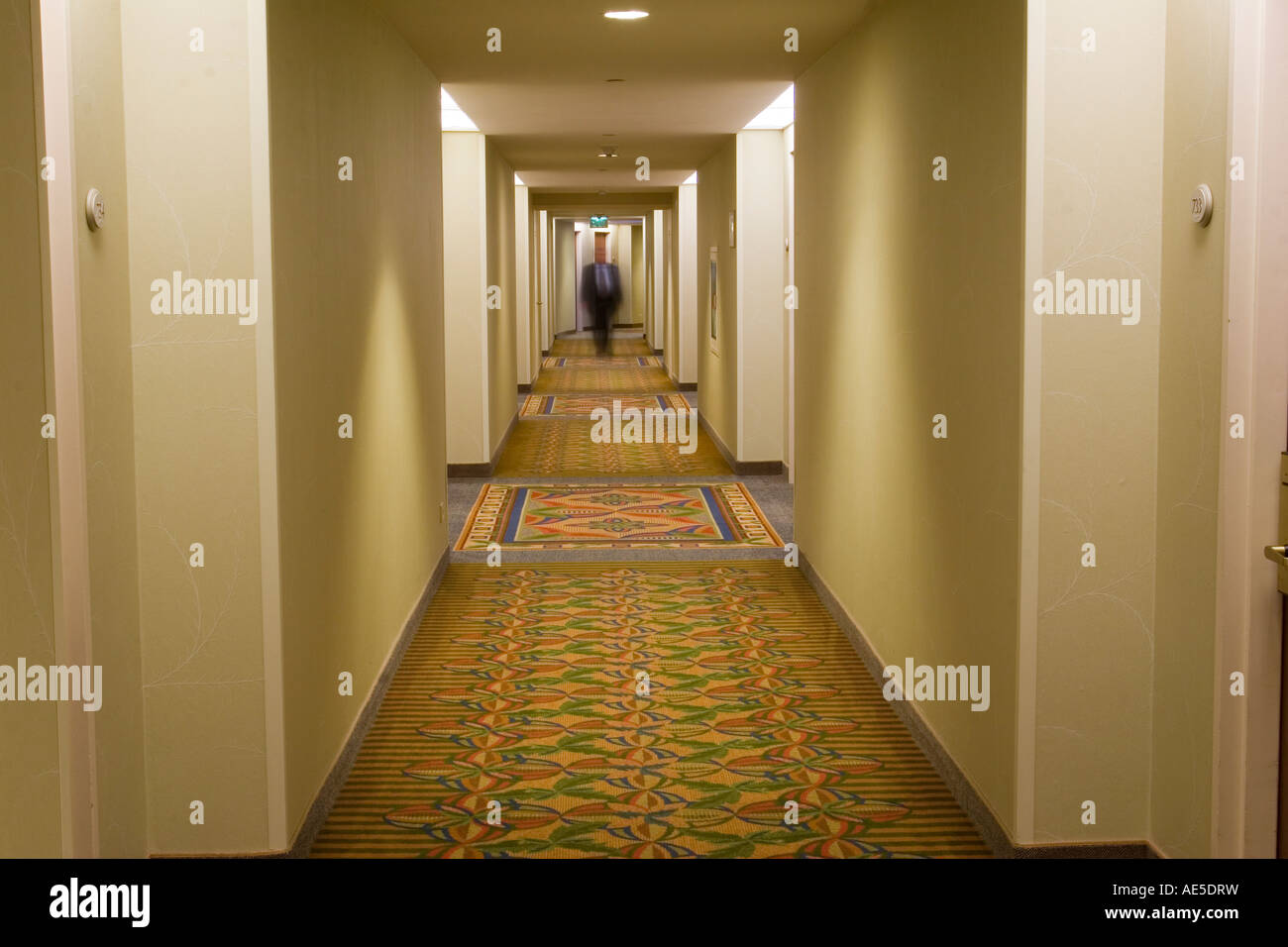 Man walks down hotel hi-res stock photography and images - Alamy