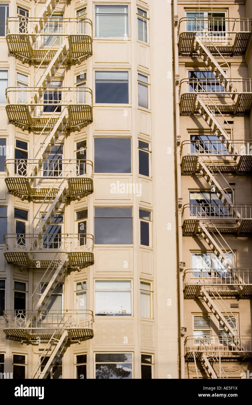 Two columns of fire escapes on two tall residential buildings in ...