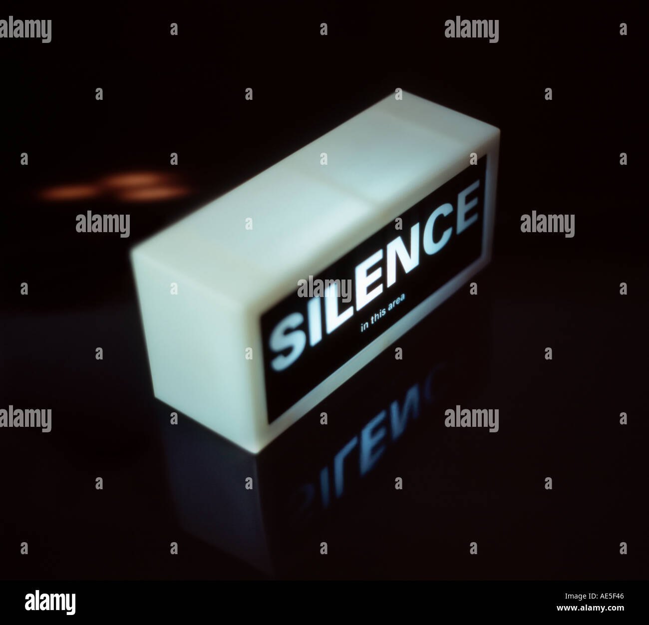 silence light box on black reflective background Stock Photo - Alamy