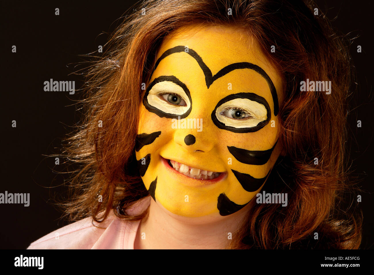 Portrait of girl (9-10 years) with bumble or wasp face paint Stock ...