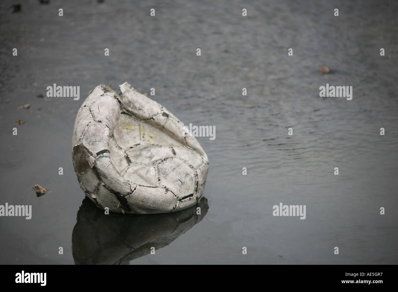 Deflated football hi-res stock photography and images - Alamy