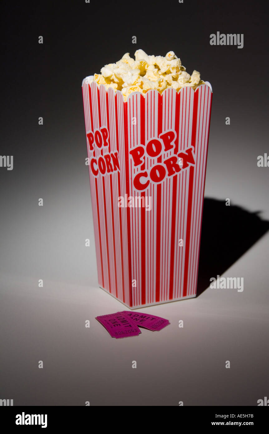 Box of popcorn and movie ticket Stock Photo - Alamy