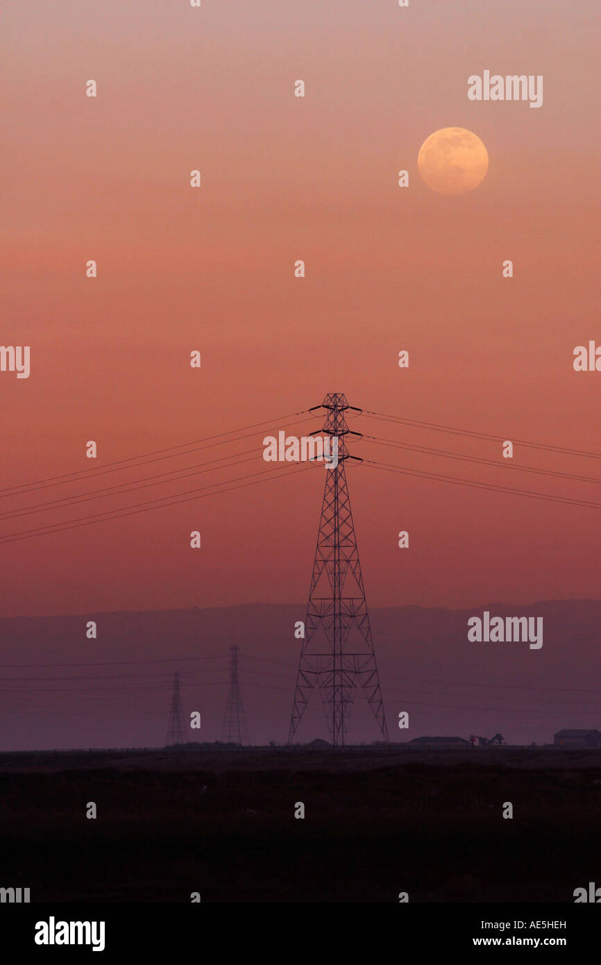 Electricity transmission tower rising over hi-res stock photography and ...