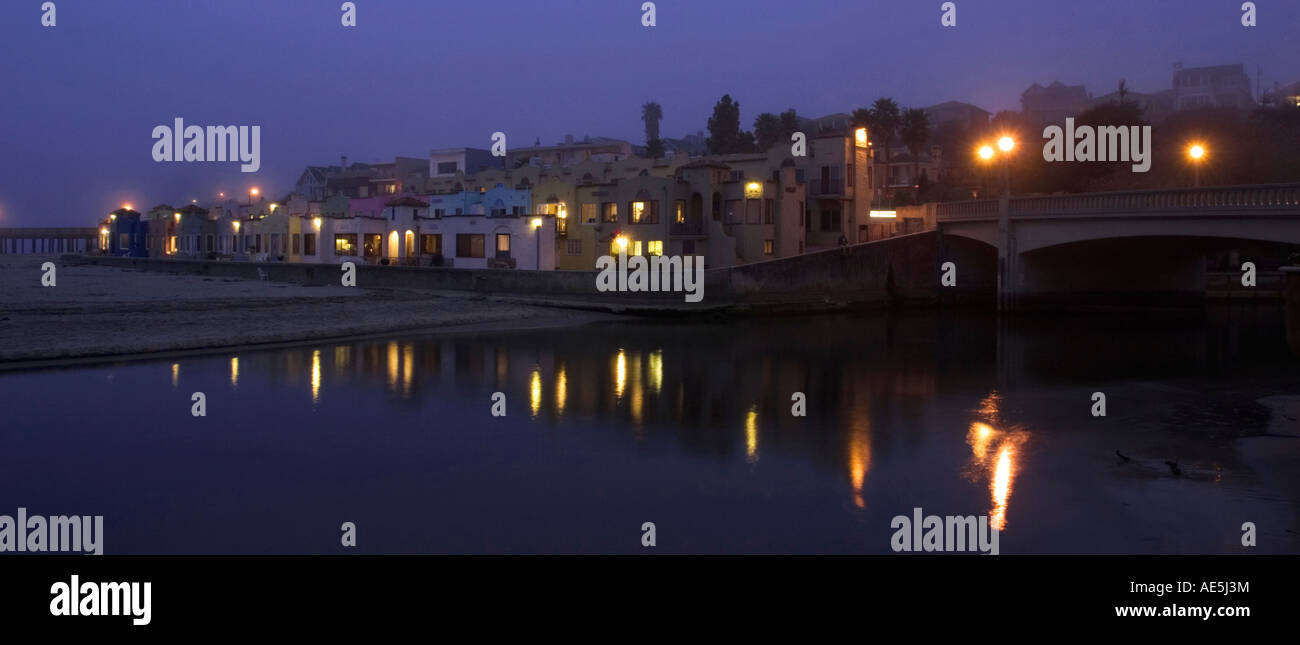 Lights from beach side cabanas in Capitola California reflecting in the ...