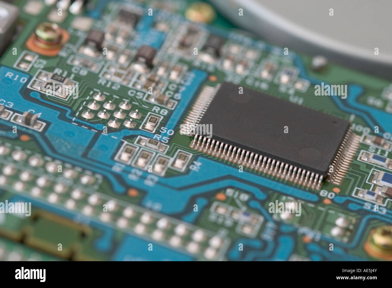 Colorful patterns on a hard disk circuit board Stock Photo - Alamy