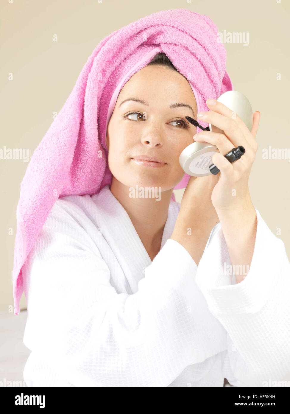 Young Woman Alone Getting Ready In The Morning Applying Face Makeup ...