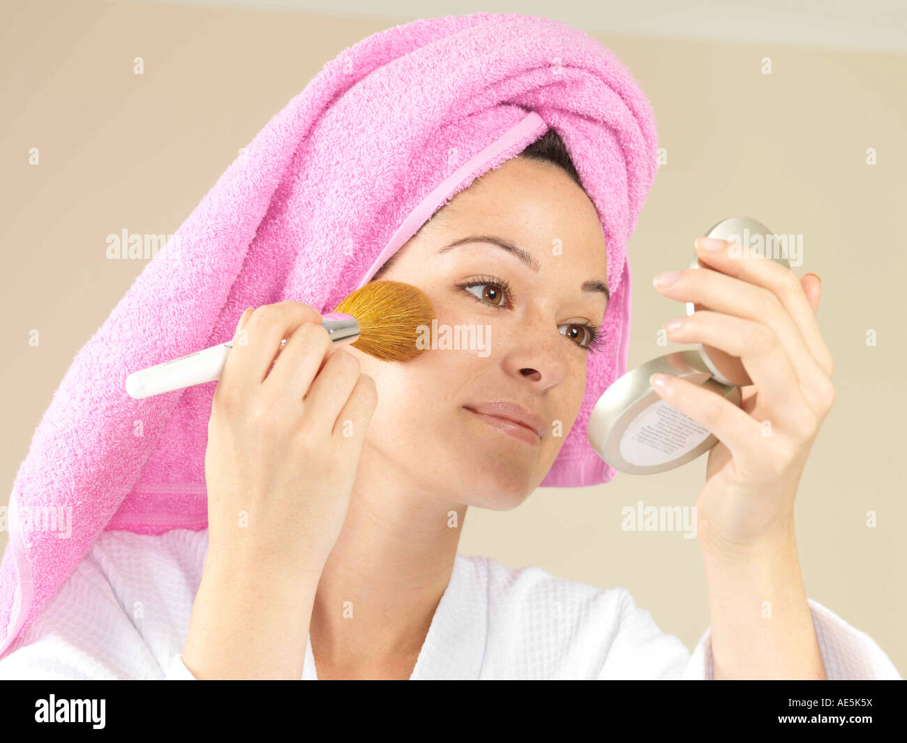 Young Woman Alone Getting Ready In The Morning Applying Face Makeup ...
