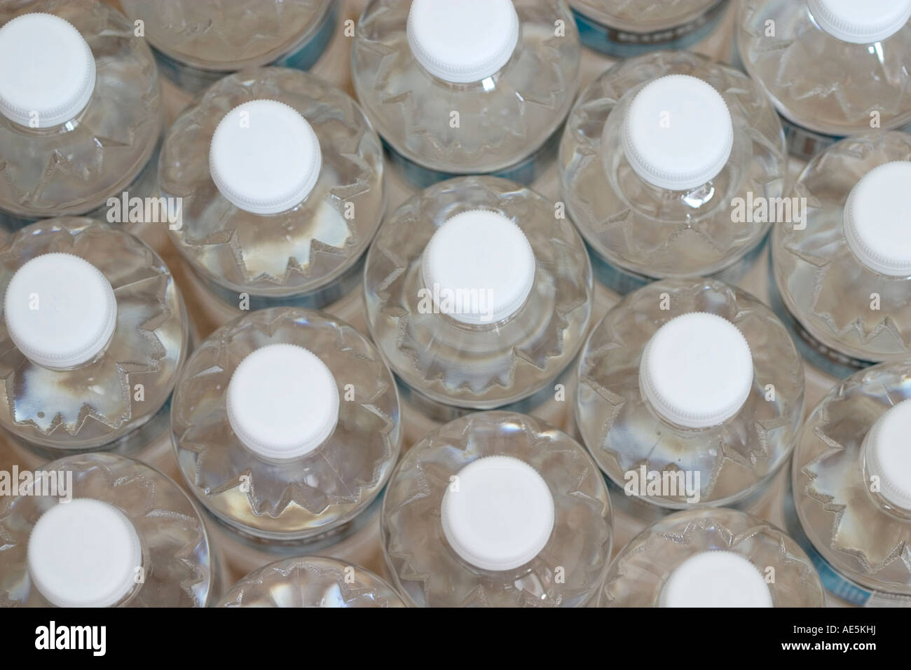 Look top down on an array of many plastic bottles of spring water Stock ...