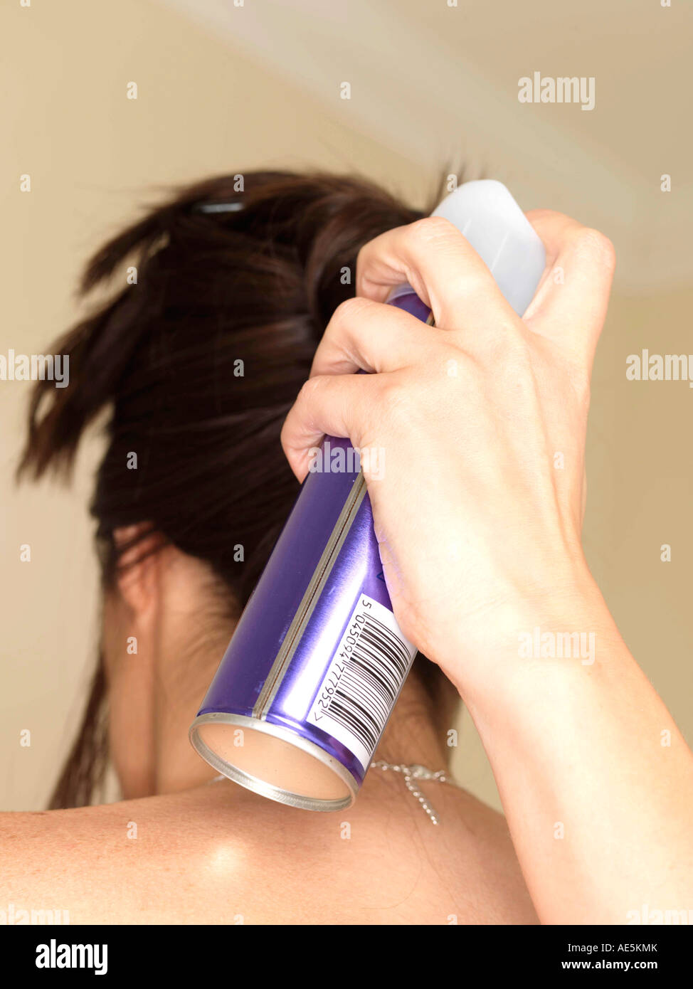 Young Women Applying Hair Spray Model Released Stock Photo - Alamy
