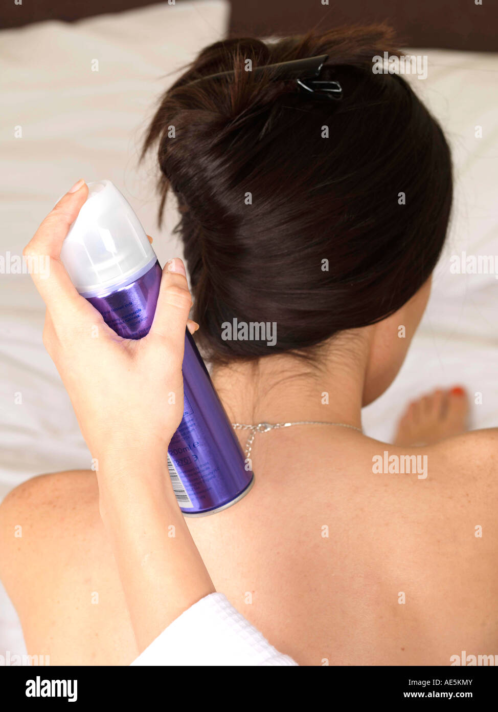 Young Women Applying Hair Spray Model Released Stock Photo - Alamy