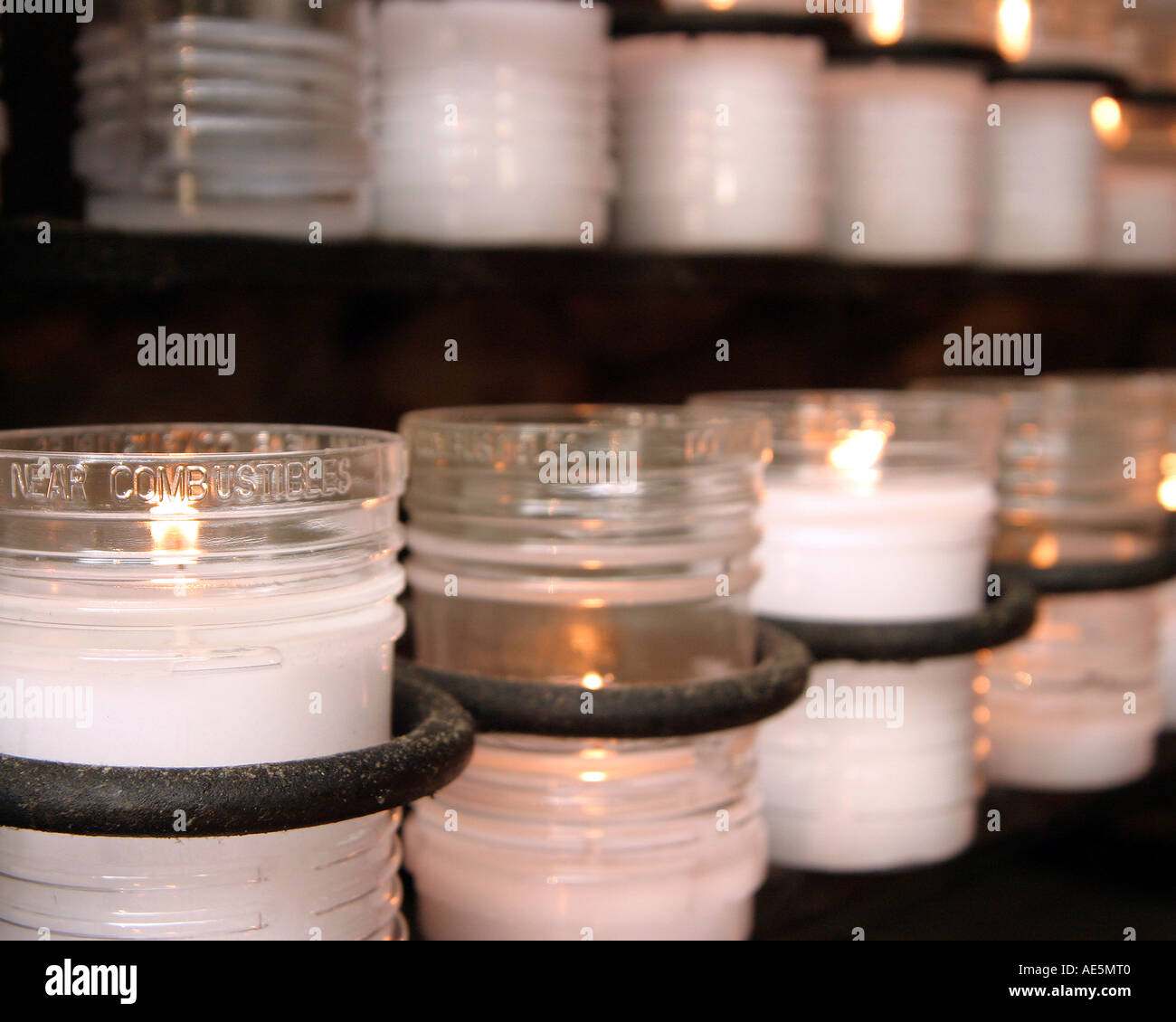 Lit candles at Grotto Stock Photo - Alamy