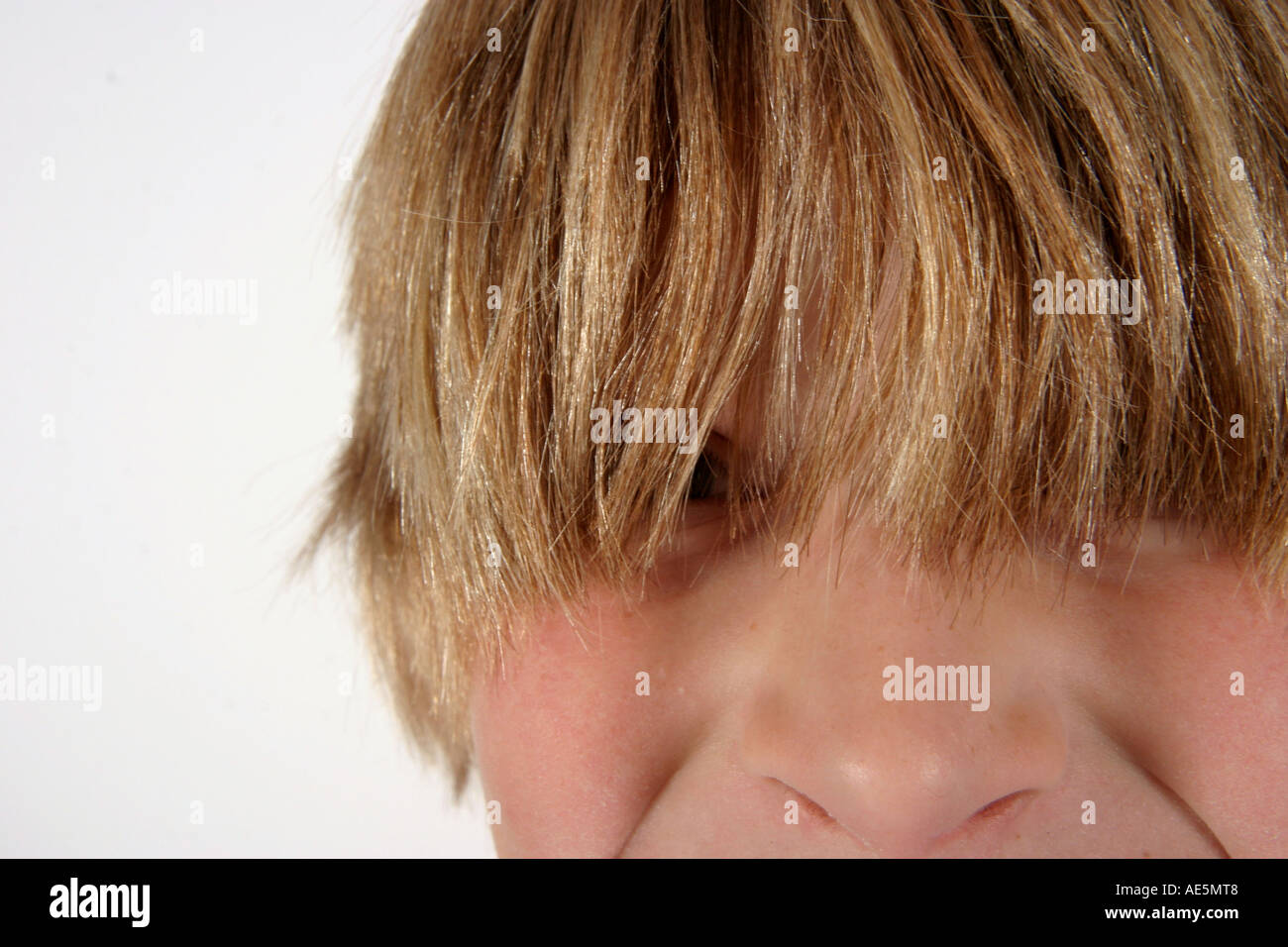 Boys hidden eyes hi-res stock photography and images - Alamy