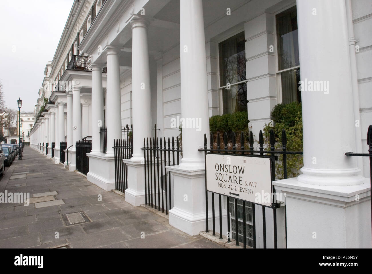 Expensive white row houses with repeating classic columns at Onslow ...