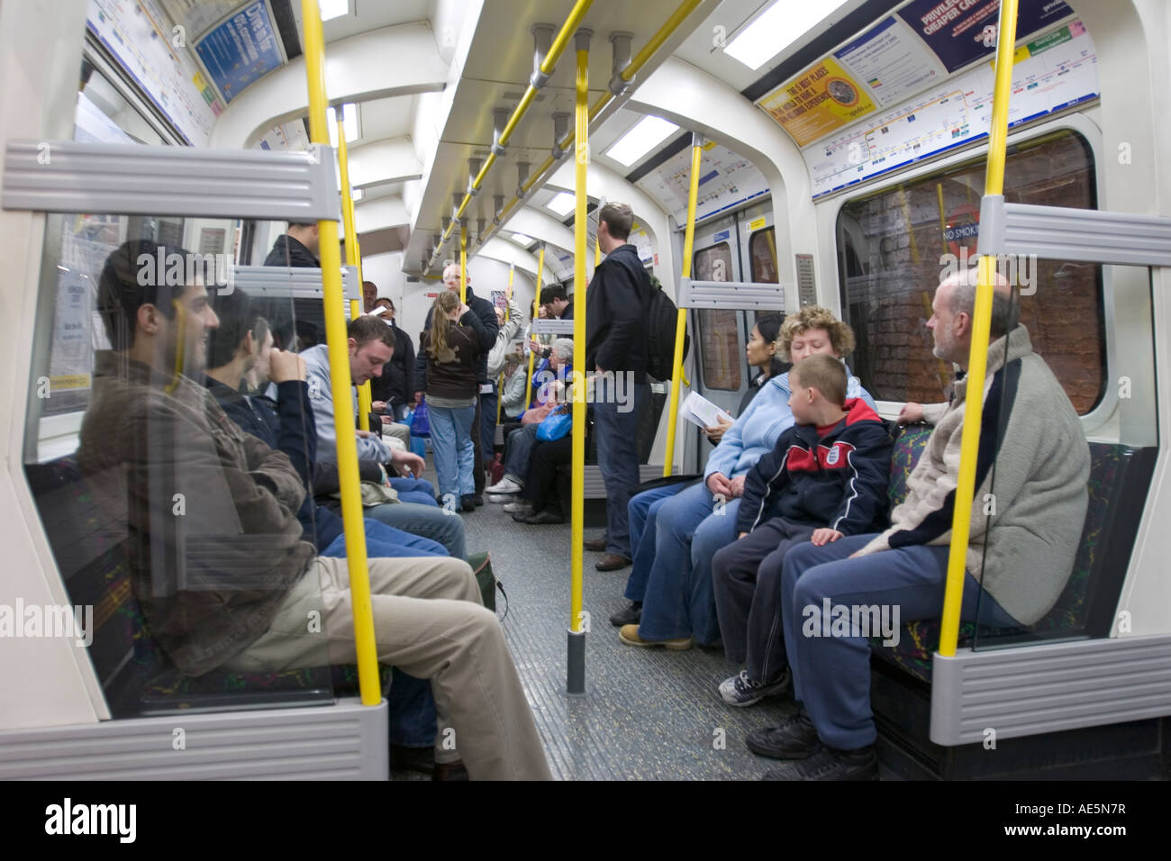Men sitting in a train car hi-res stock photography and images - Alamy