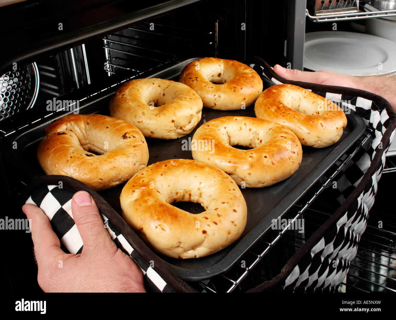 MAN BAKING BAGELS Stock Photo - Alamy