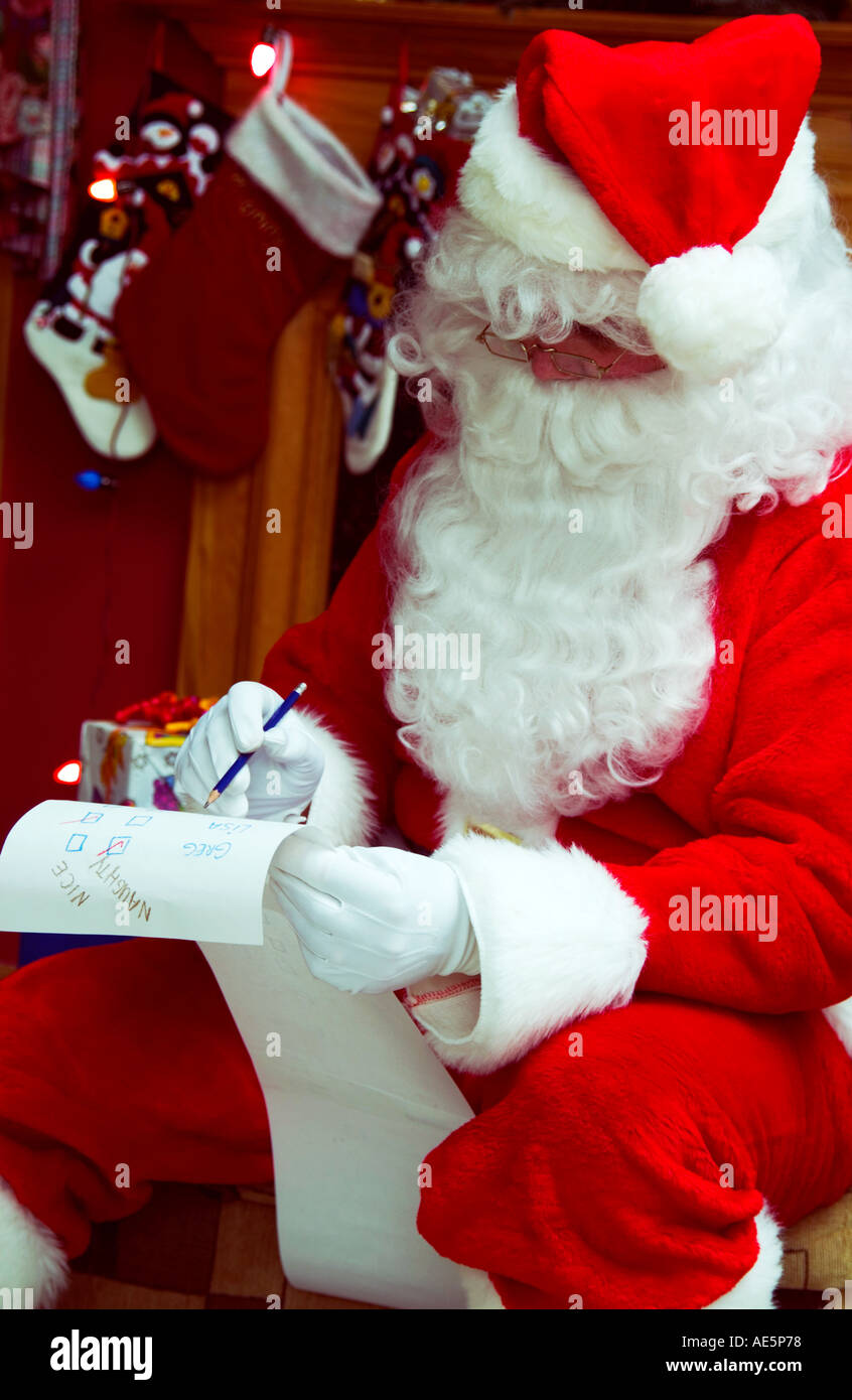 Santa with list Stock Photo - Alamy