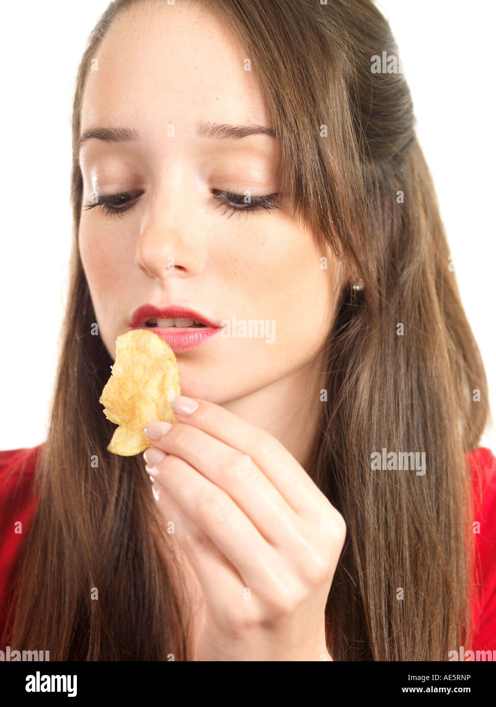 Teenage Girl Eating Crisps Model Released Stock Photo - Alamy