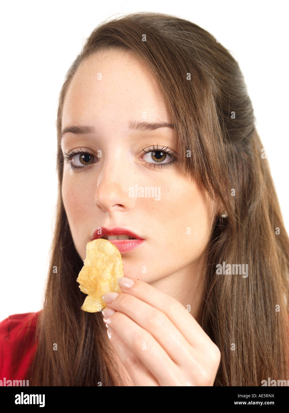 Teenage Girl Eating Crisps Model Released Stock Photo - Alamy