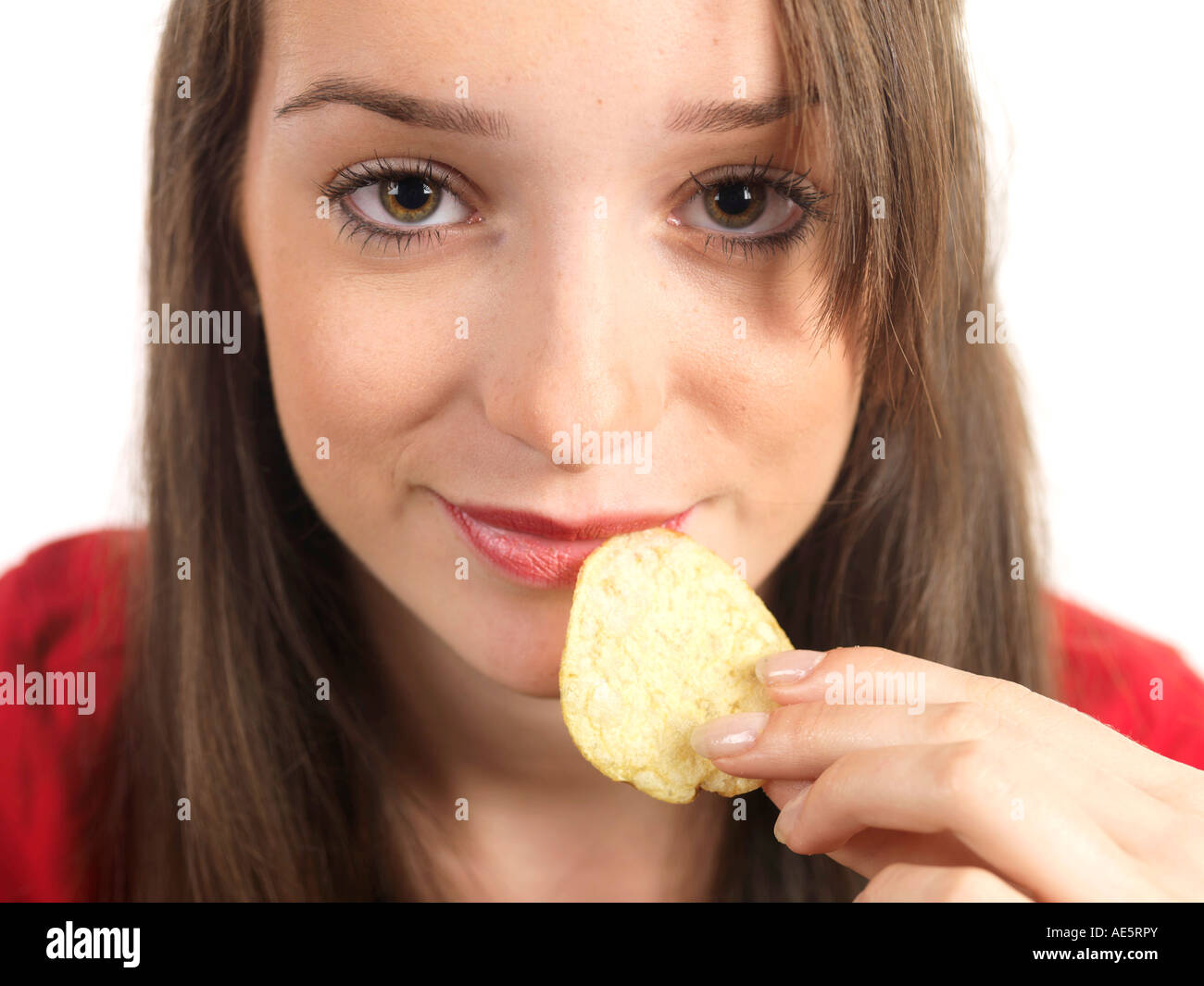 Teenage Girl Eating Crisps Model Released Stock Photo - Alamy