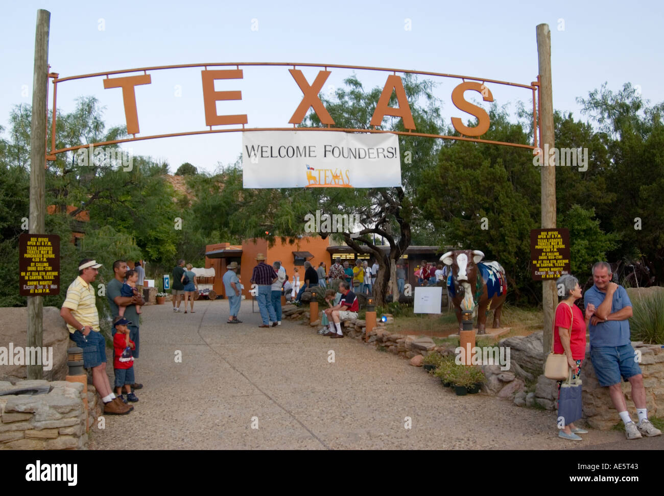 Tourists taking a break at the Texas Welcome sign in Palo Duro Canyon ...