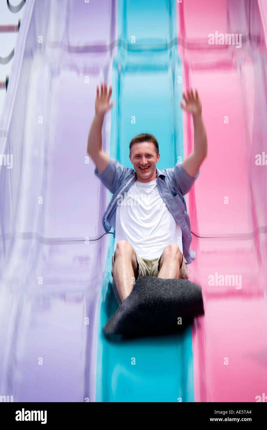 Going down the slide hi-res stock photography and images - Alamy